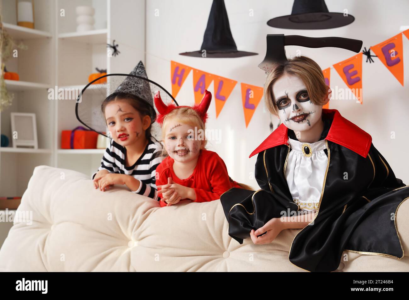 Little children celebrating Halloween at home Stock Photo - Alamy