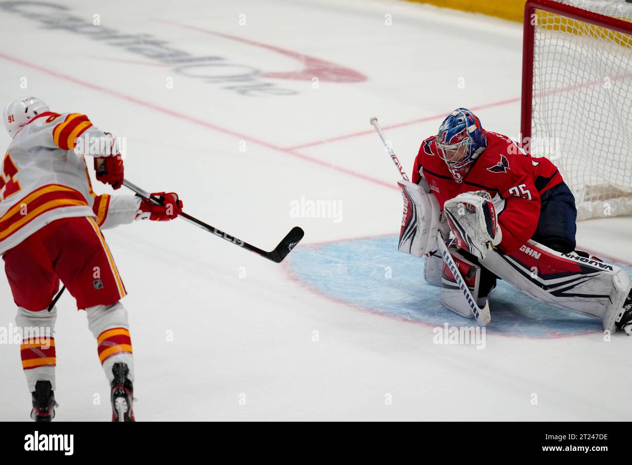 Calgary Flames center Nazem Kadri (91) has his shot blocked by ...