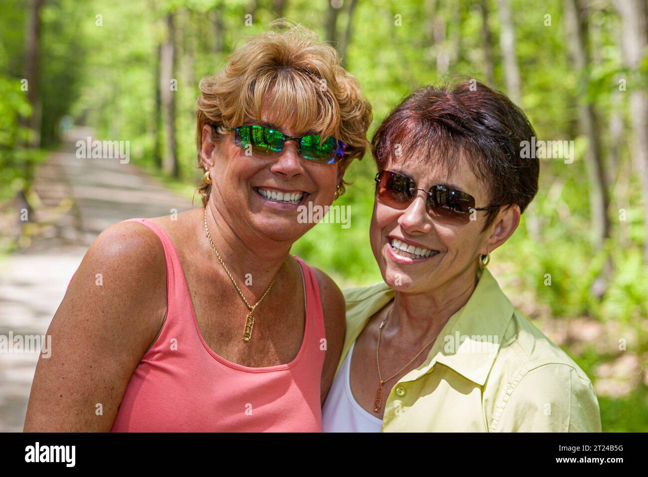 Two women enjoying their time on a walking trail in Massachusetts Stock ...
