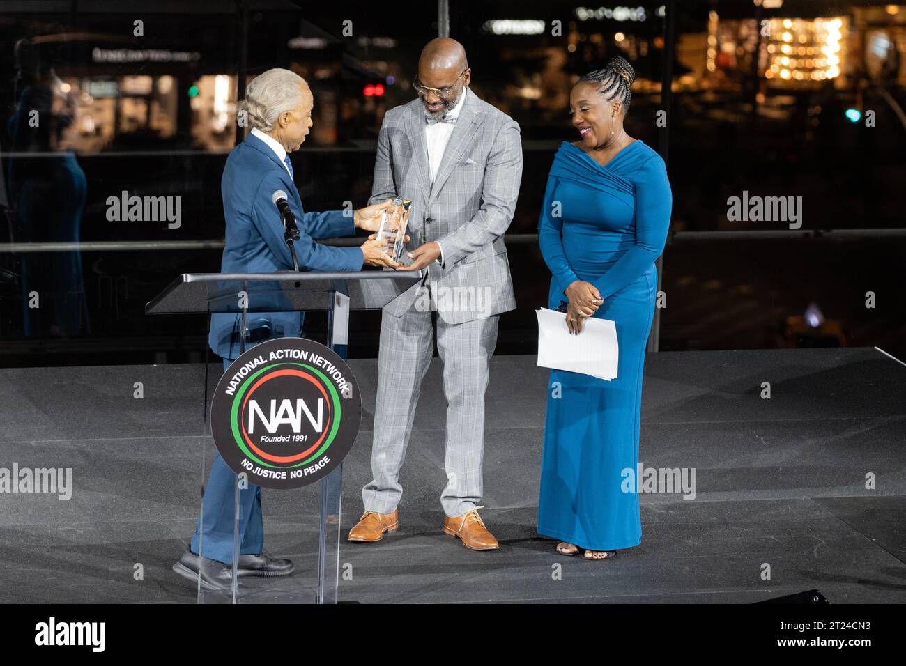 Reverend Al Sharpton gives award to Stephanie and Floyd Rance during ...