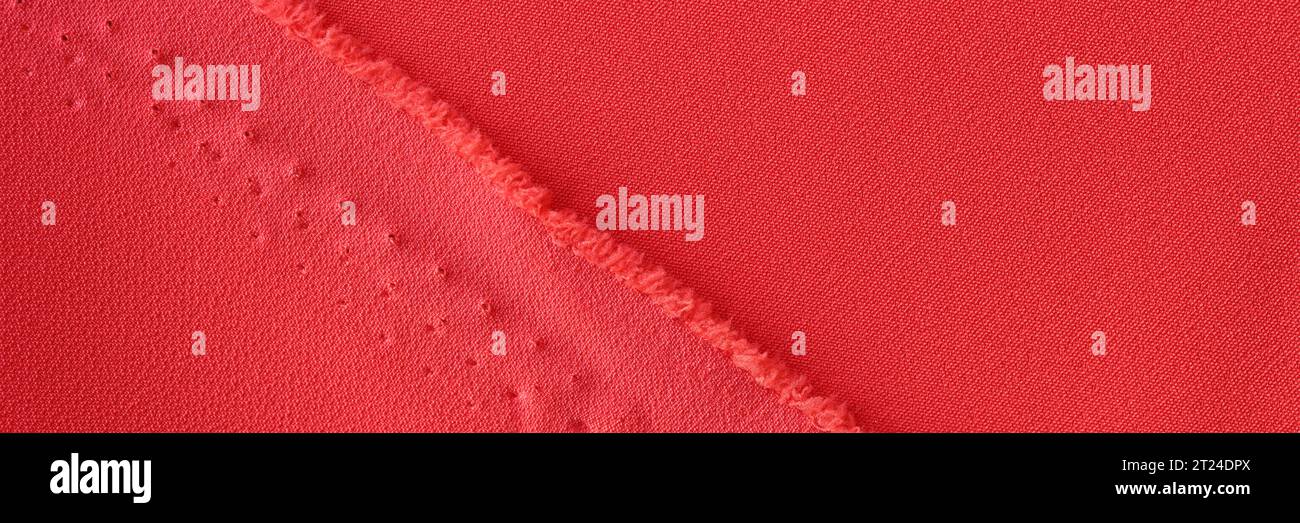 Straight neat undone seam of bright red fabric for clothes Stock Photo ...