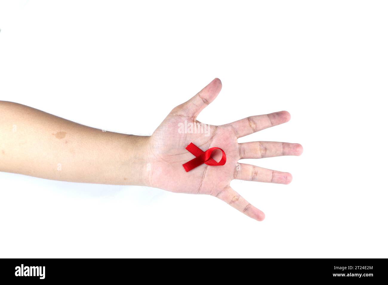 hand symbol with red ribbon Stock Photo - Alamy