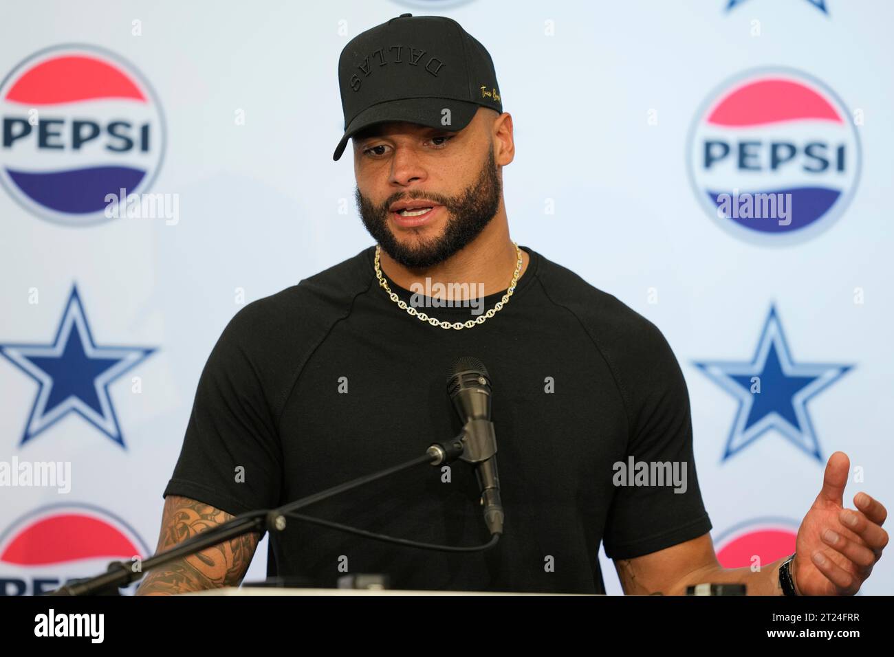 Dallas Cowboys quarterback Dak Prescott (4) answers questions during a ...