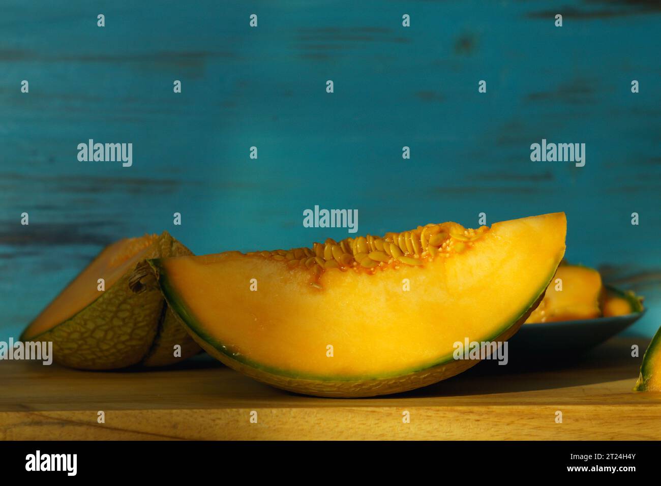 Melon close-up cut. Cooking food in the kitchen in summer Stock Photo ...
