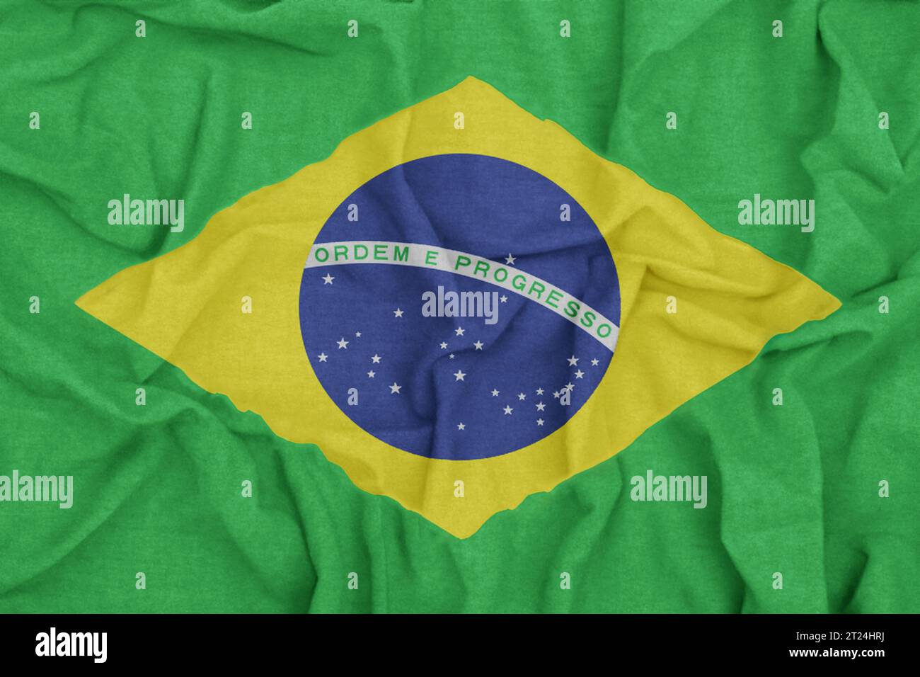 Brazilian Brazil flag with vibrant colors and fabric background Stock ...