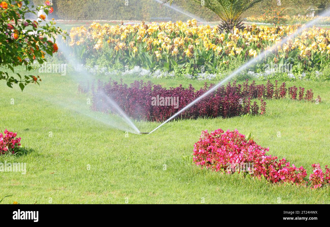 Automatic sprinkler system in operation hi-res stock photography and images - Alamy