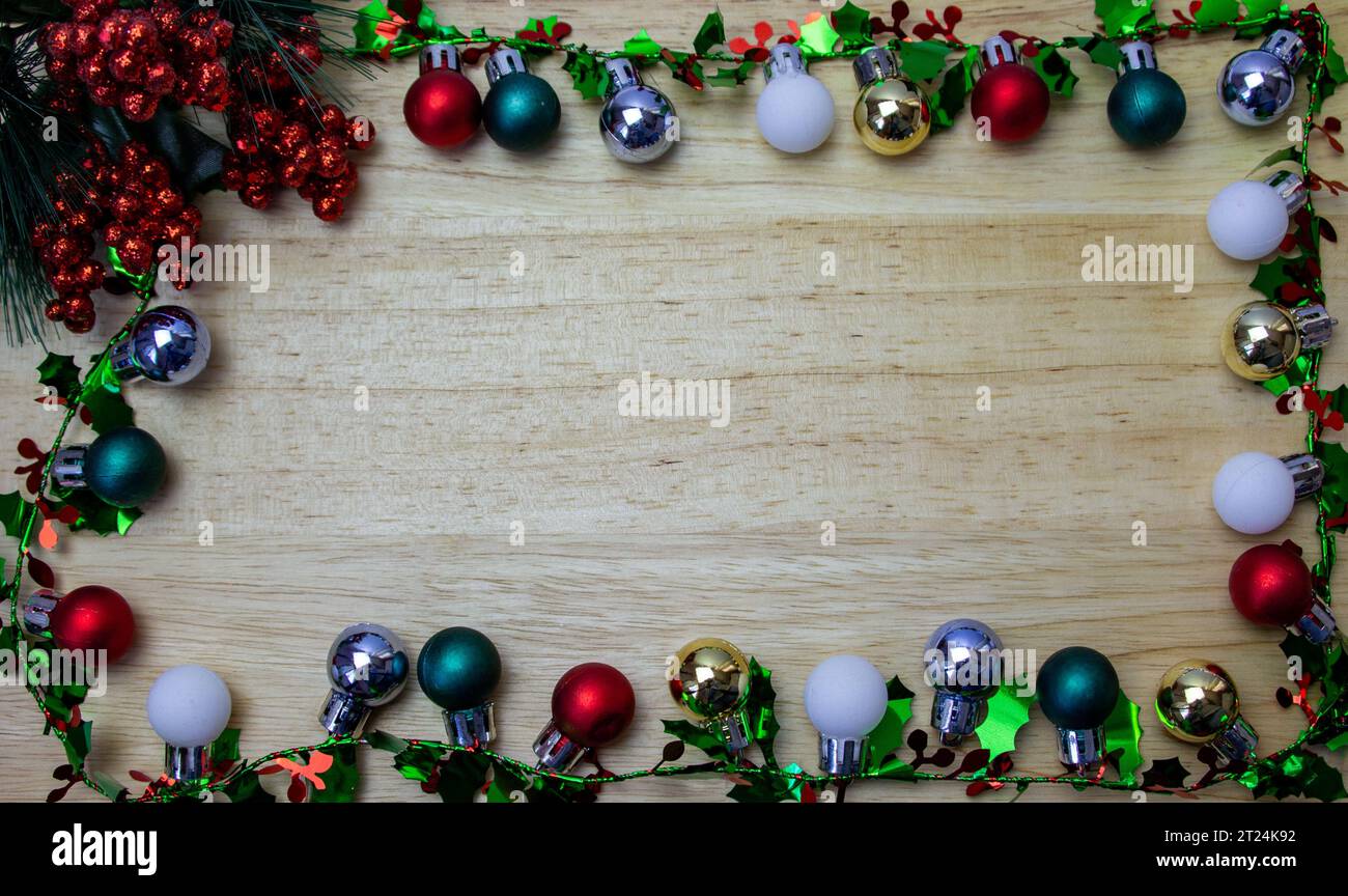 Christmas decorations on timber background Stock Photo - Alamy