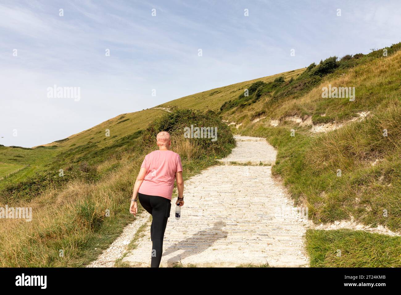 Model released woman lady walking from Lulworth Cove to Durdle Door on ...