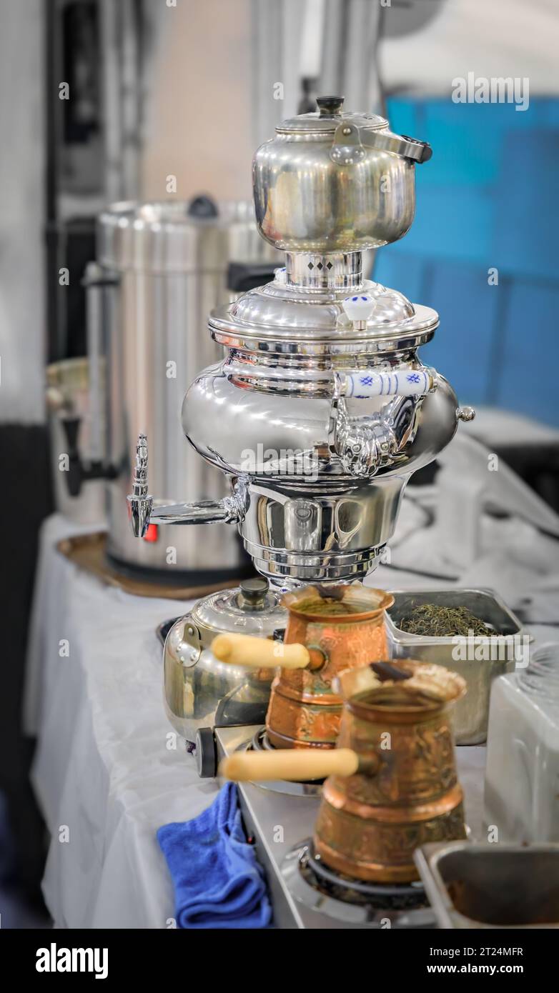 Traditional Russian samovar tea pot and Turkish cezve or ibrik copper ...