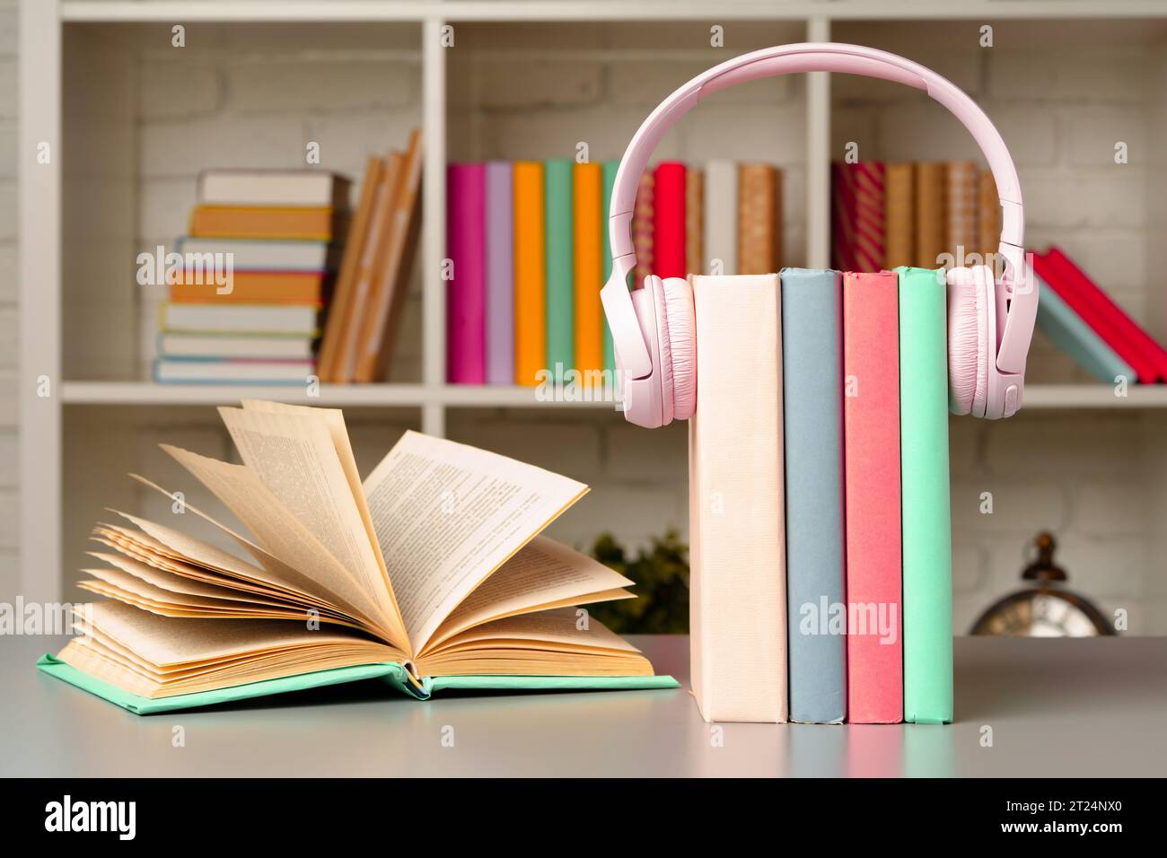 Stack of books with headphone hi-res stock photography and images - Alamy
