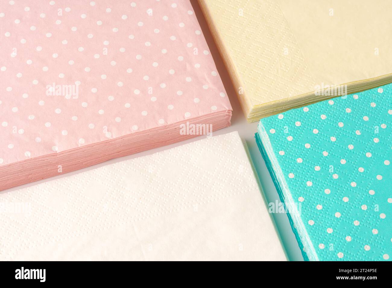 Colorful square paper napkins background top view Stock Photo - Alamy