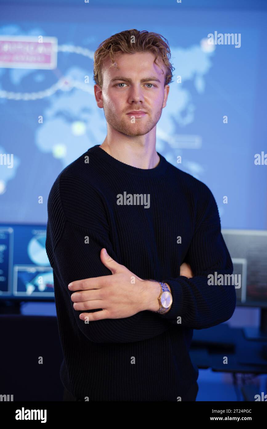 Male Cybersecurity Analyst in large Cyber Security Operation Center SOC ...