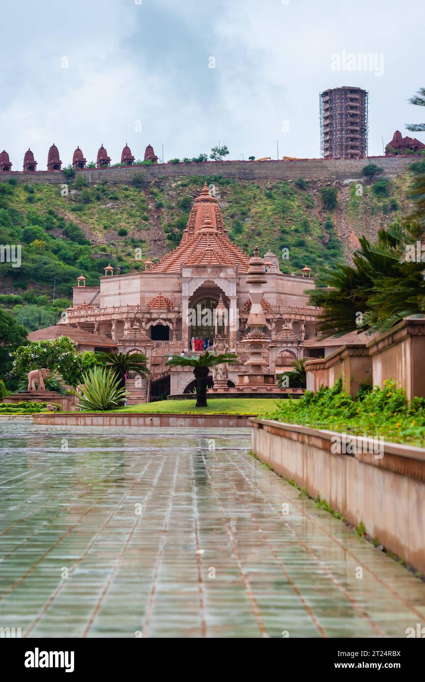 artistic red stone jain temple at morning from unique angle image is ...