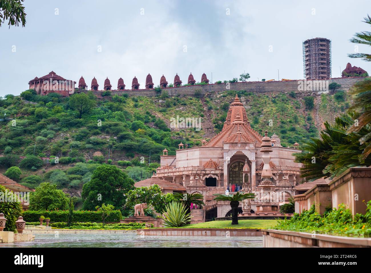 artistic red stone jain temple at morning from unique angle image is ...