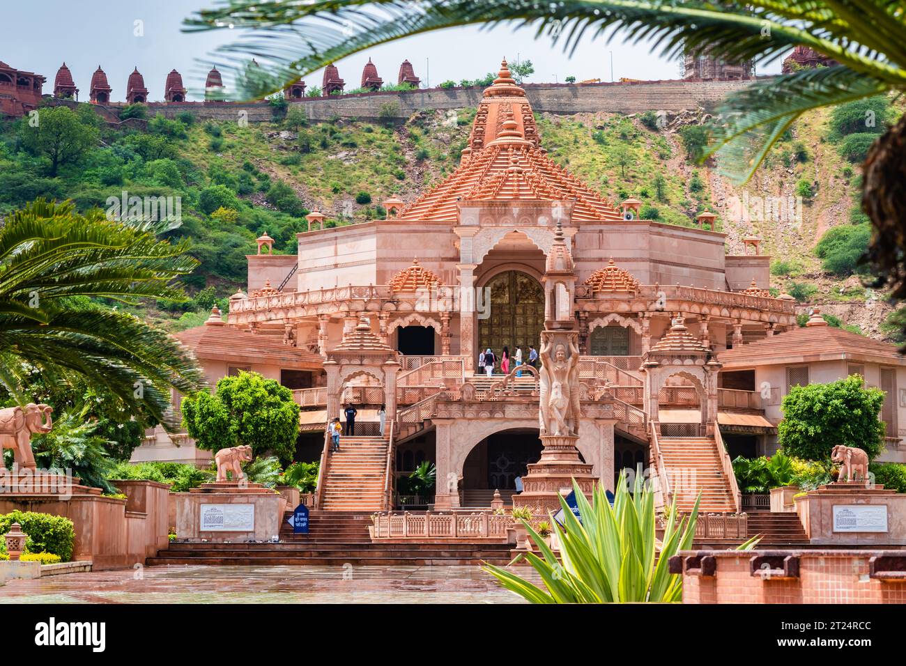artistic red stone jain temple at morning from unique angle image is ...