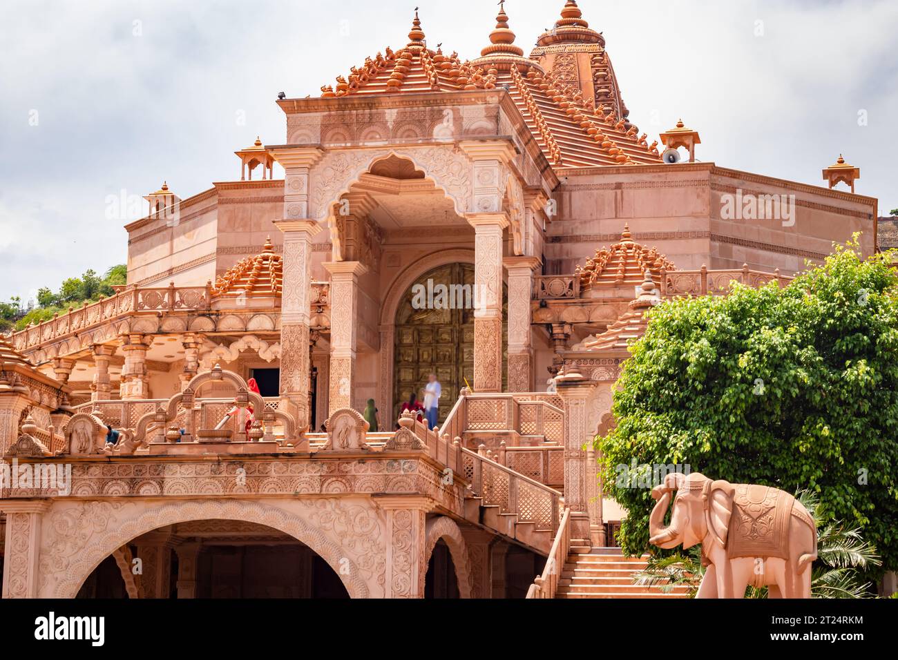 artistic red stone jain temple at morning from unique angle image is ...