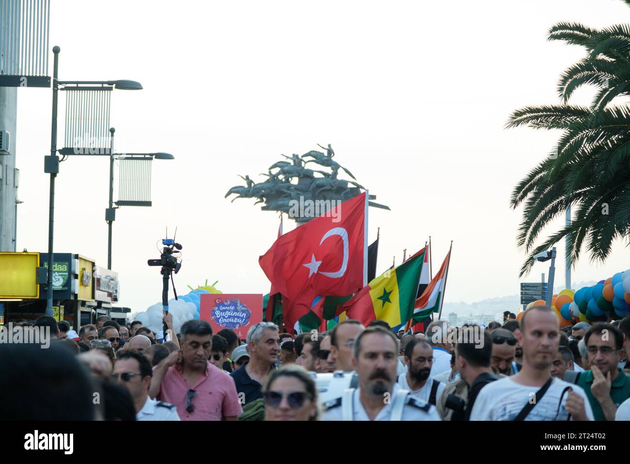 Izmir, Turkey - September 1, 2023: Crowds wave flags of various ...