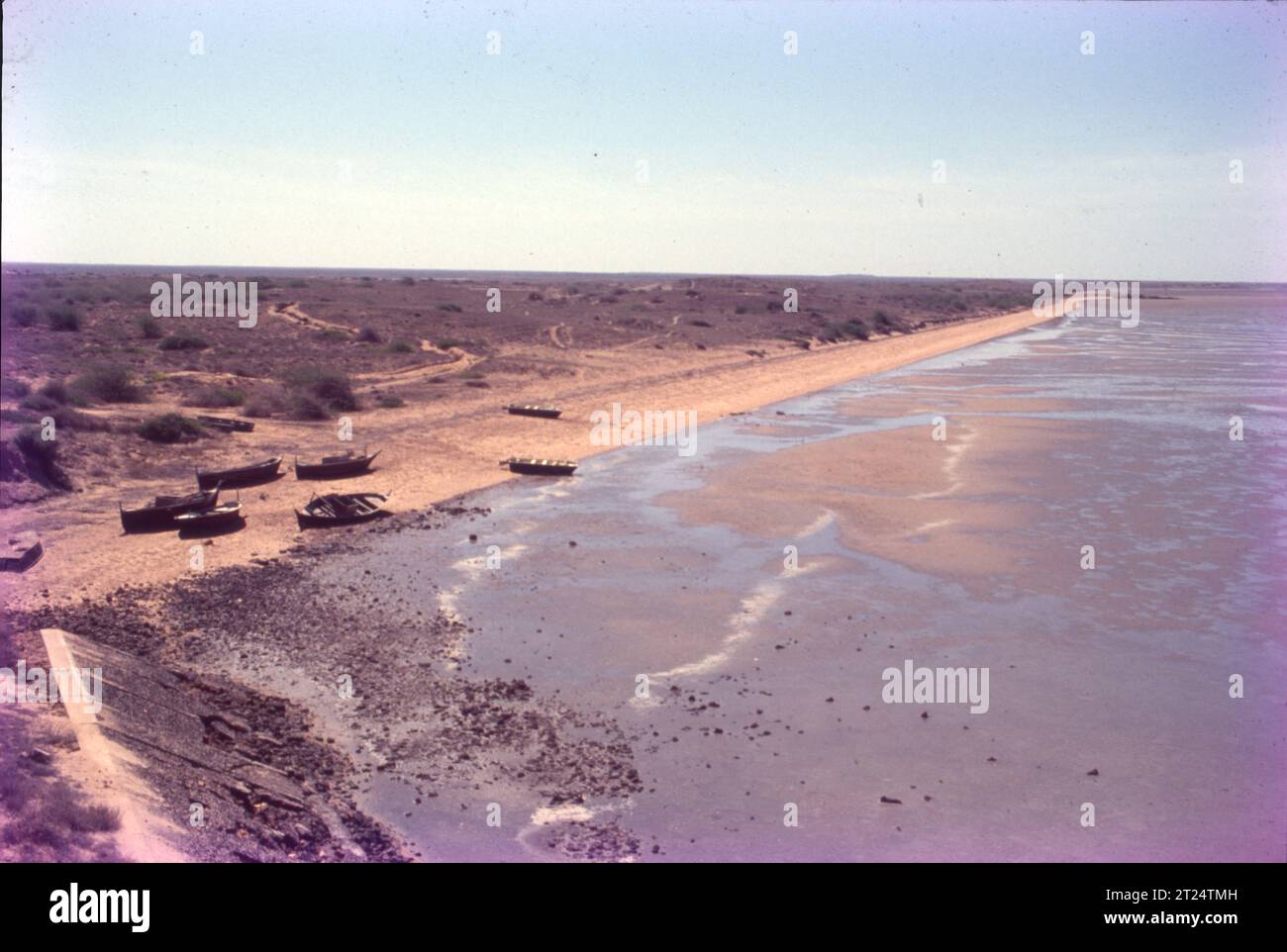 A small jetty in Koteshwar in the Kori Creek at low tide in the western ...