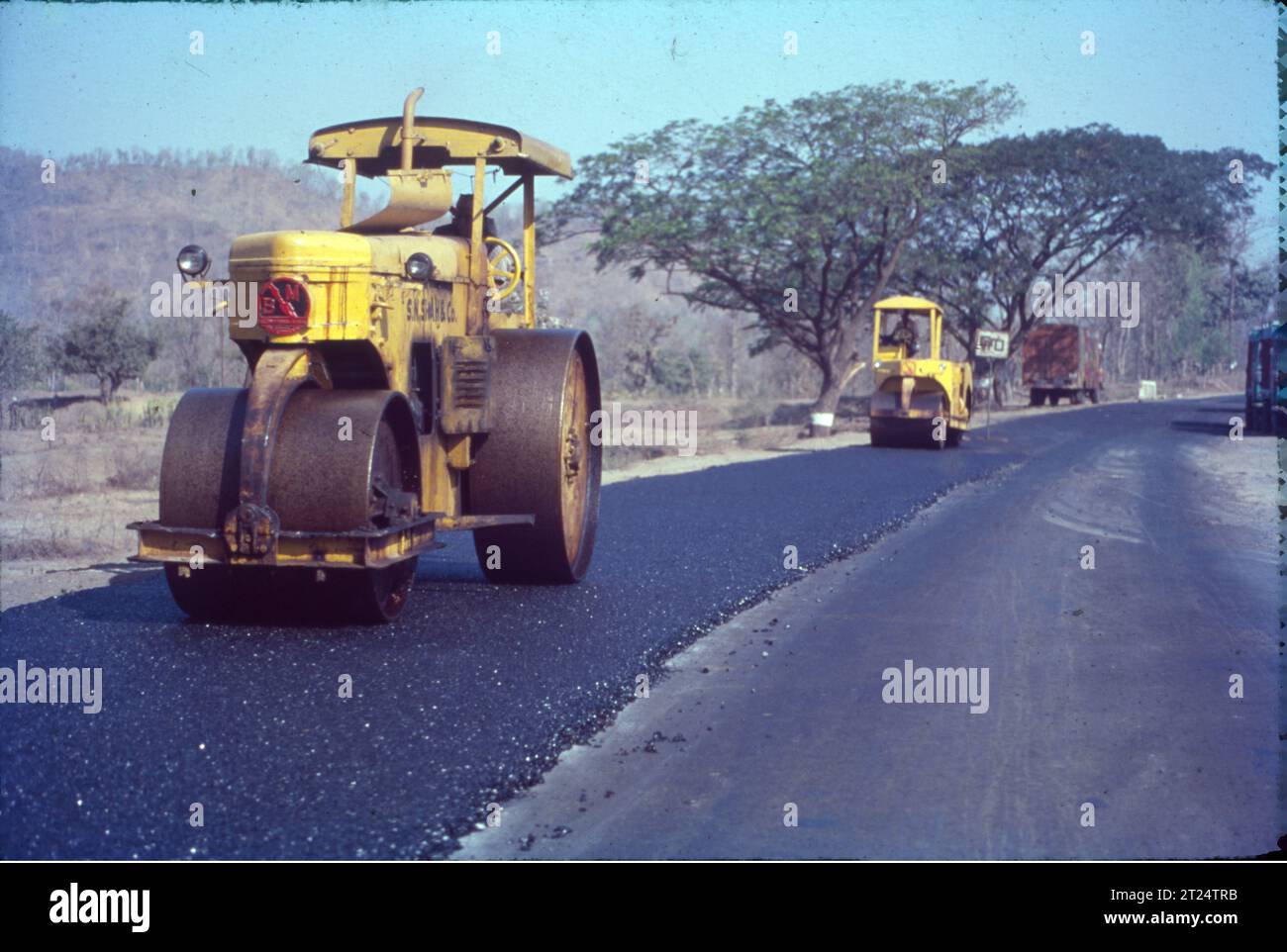 Machine laying tared stones hi-res stock photography and images - Alamy