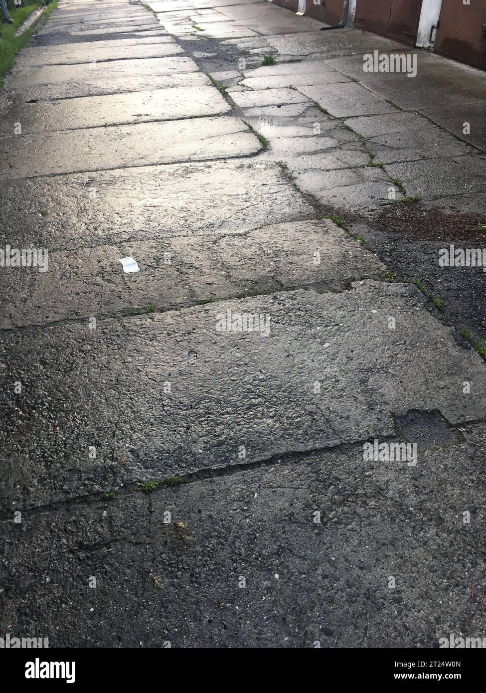 The road is paved with concrete slabs Stock Photo - Alamy