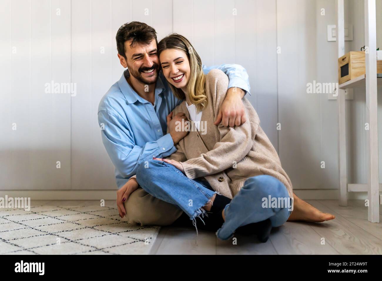 A loving relationship. Beautiful couple hugging and having fun together ...