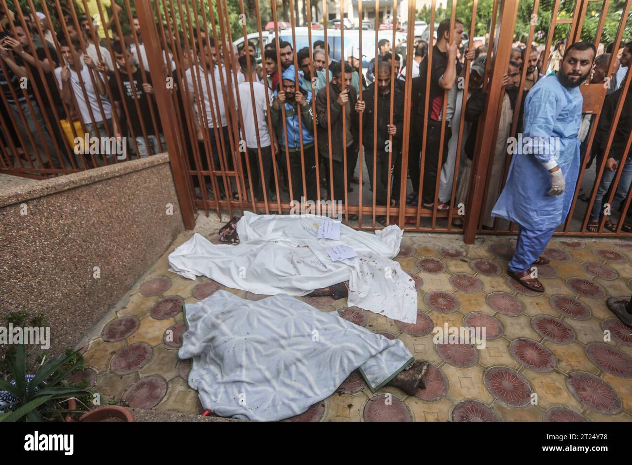 Khan Yunis, Palestinian Territories. 17th Oct, 2023. Palestinians look ...