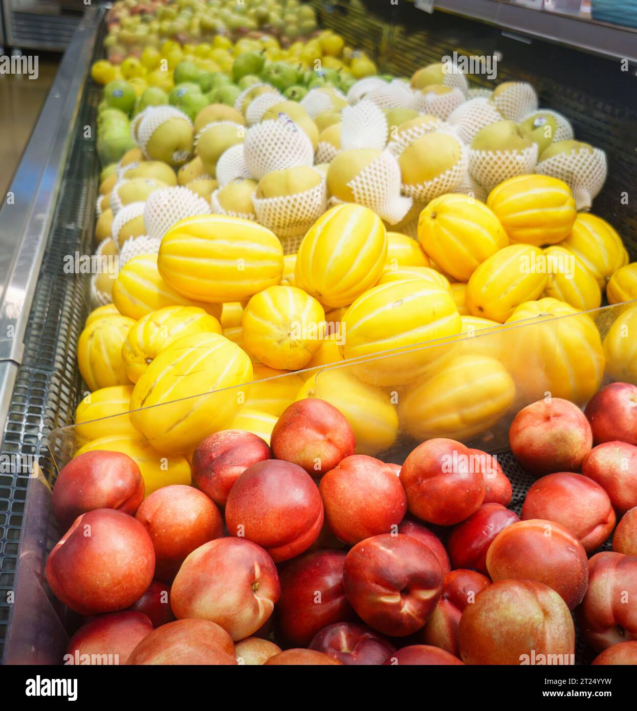 Colourful fresh fruit in the supermarket. California. Vertical format ...