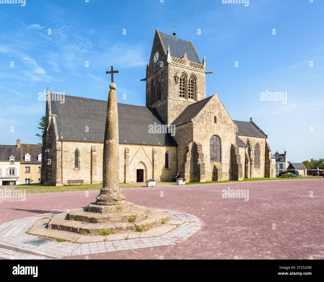 Calvary and Sainte-Mere-Eglise's church with a paratrooper dummy hung ...