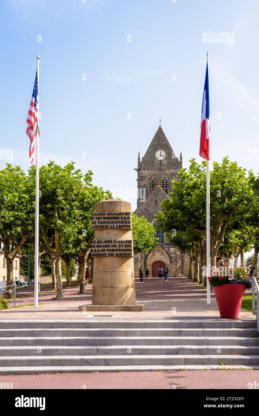 Liberation Monument with Sainte-Mere-Eglise's church in the distance ...