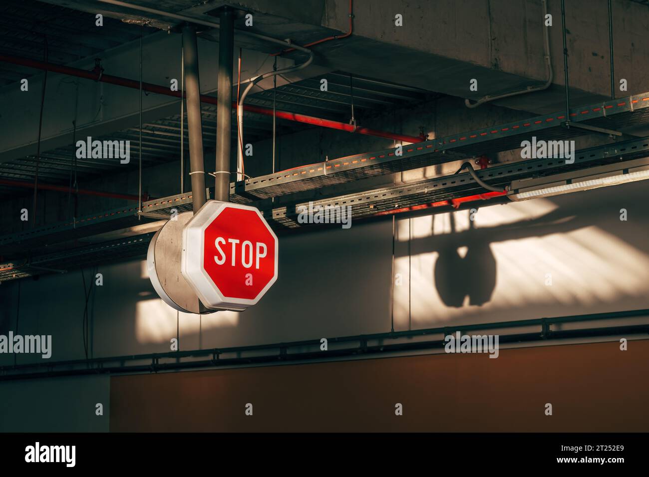Stop sign in underground garage of shopping mall, selective focus Stock ...
