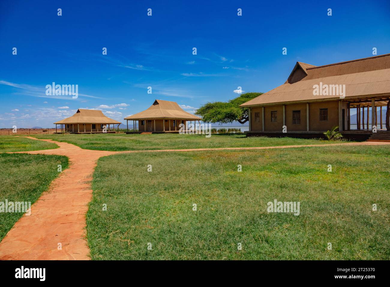 Scenic view of lakeshore cabins at Lake Jipe Campsite at Tsavo West ...