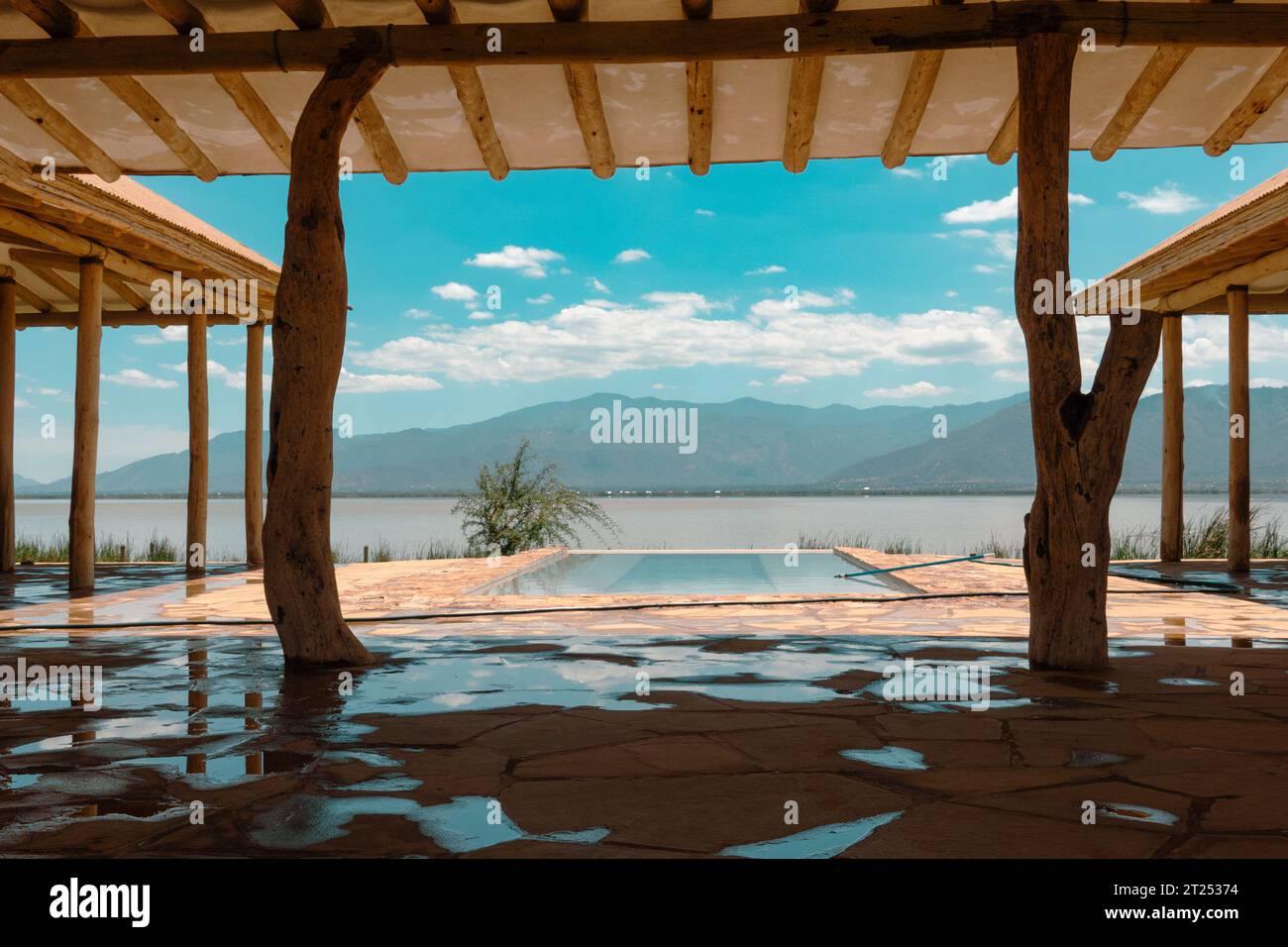Scenic view of an infinity swimming pool against the background of Lake ...