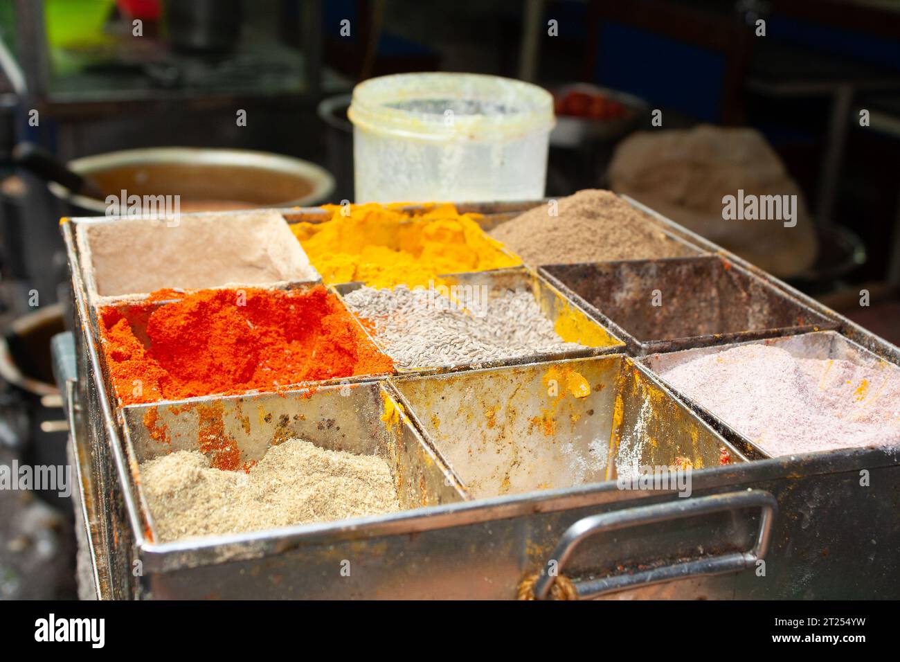 Close-up of assorted spices at a street food stand, Old Delhi, India ...