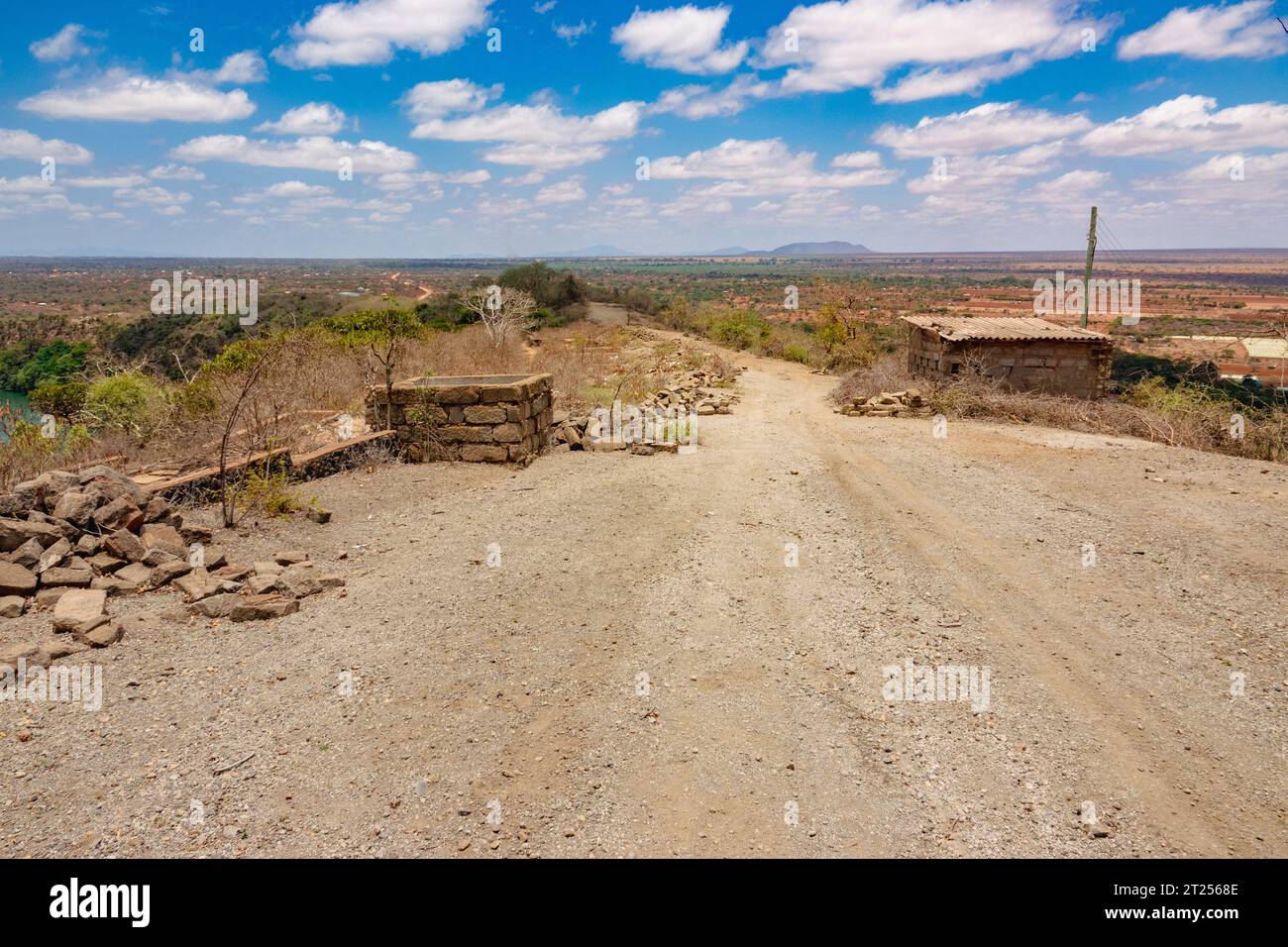 Scenic view of a dirt road in the panoramic arid landscapes of Voi ...