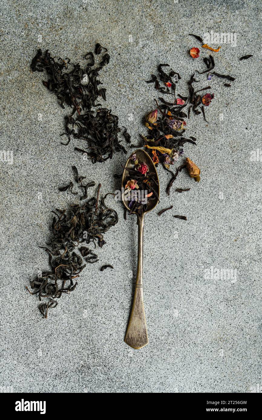 Overhead view of a vintage teaspoon with loose tea leaves Stock Photo ...