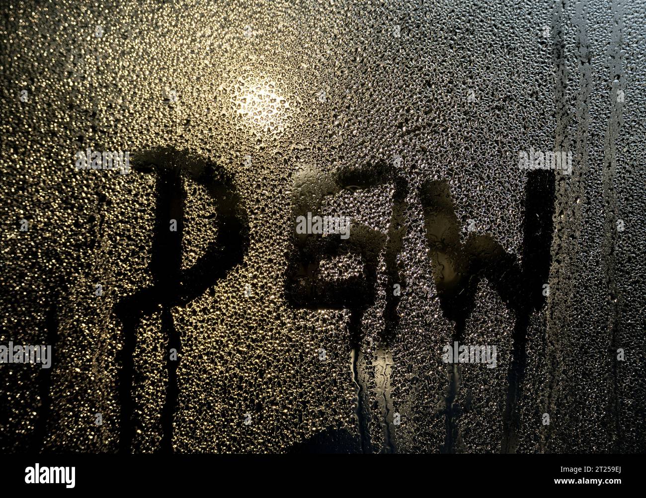 DEW written on window condensation Stock Photo - Alamy