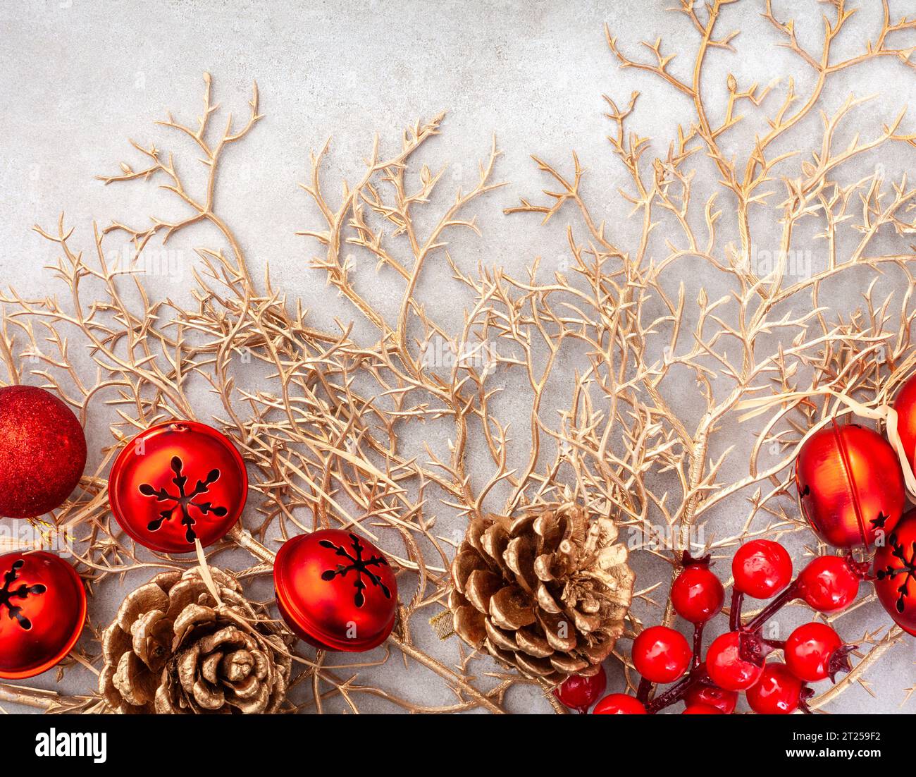 Decorative Christmas background with golden pinecones and rustic red ...