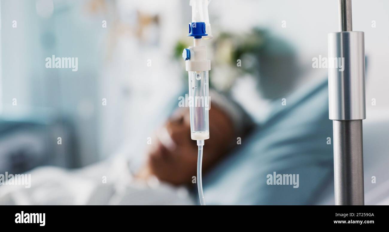 Iv drip, patient and medicine in hospital for healthcare, nutrition or water in bed with healing ...