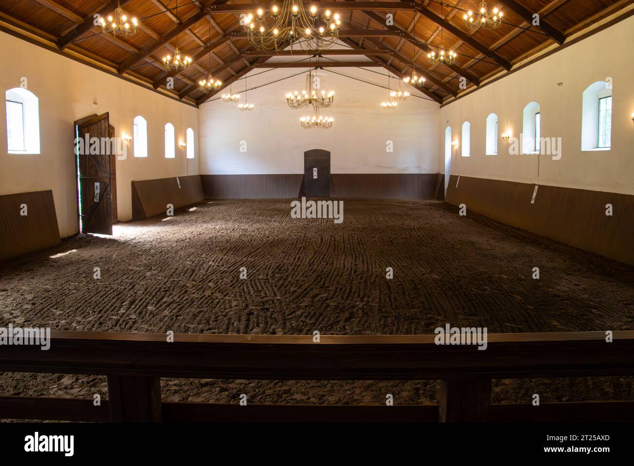 Indoor empty equestrian space. View in an indoor riding hall Stock ...