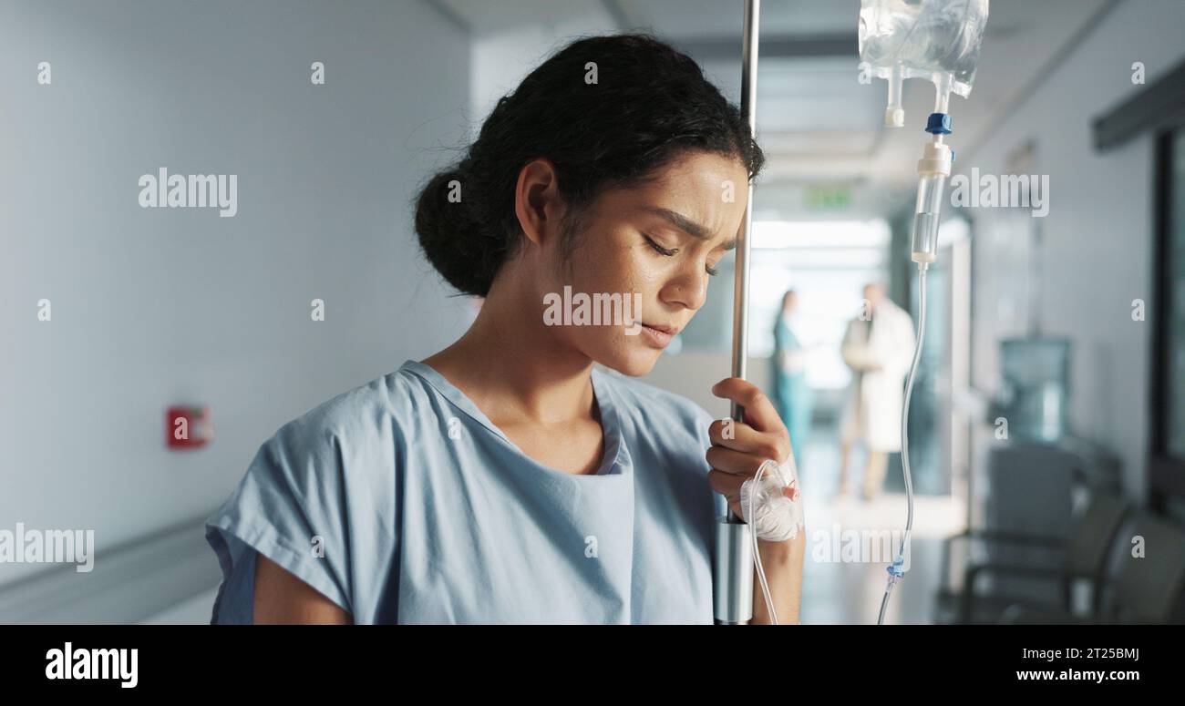 Sad, breathing and a woman with an iv drip at hospital for medicine ...