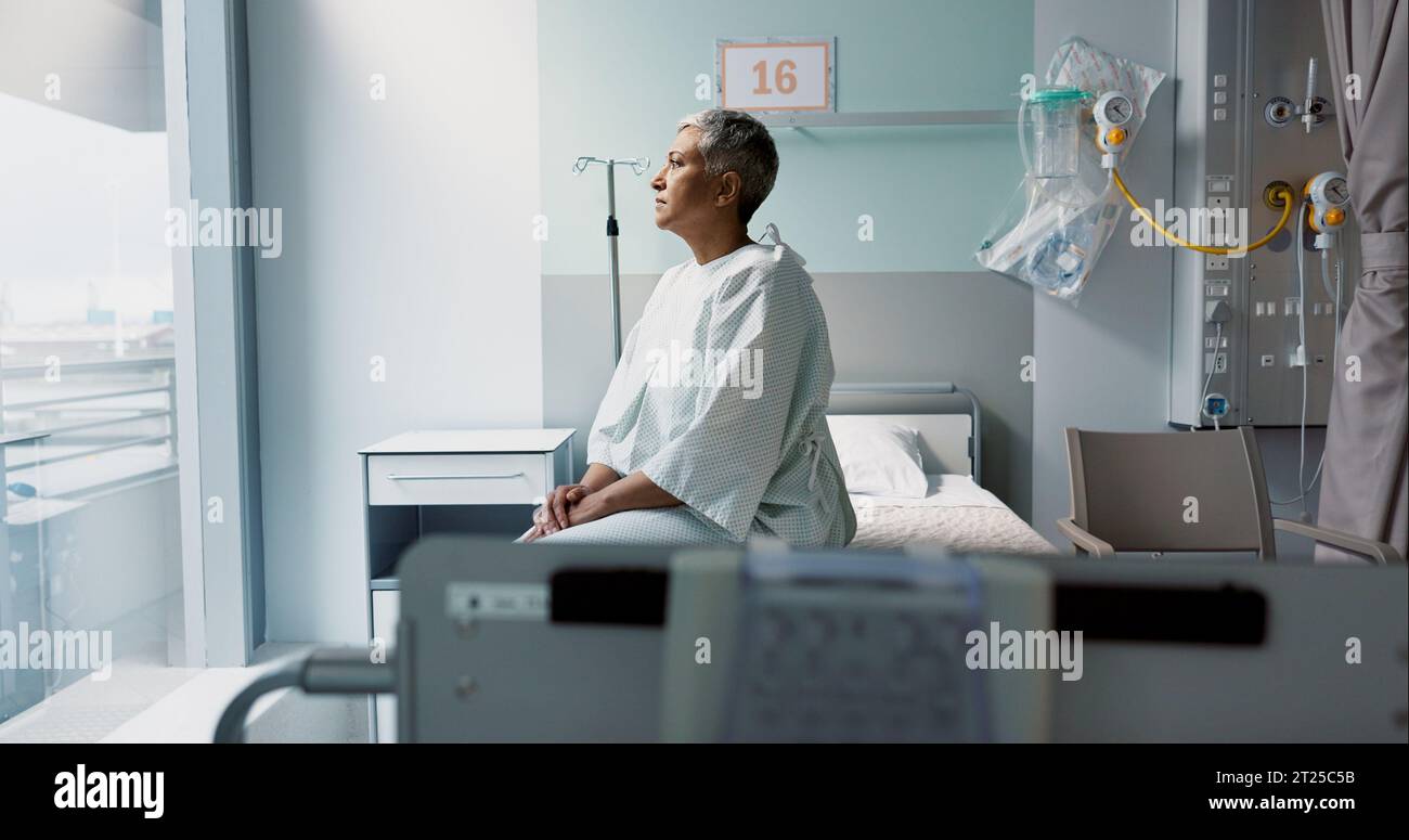 Sad, patient and thinking in hospital with window and stress, anxiety ...