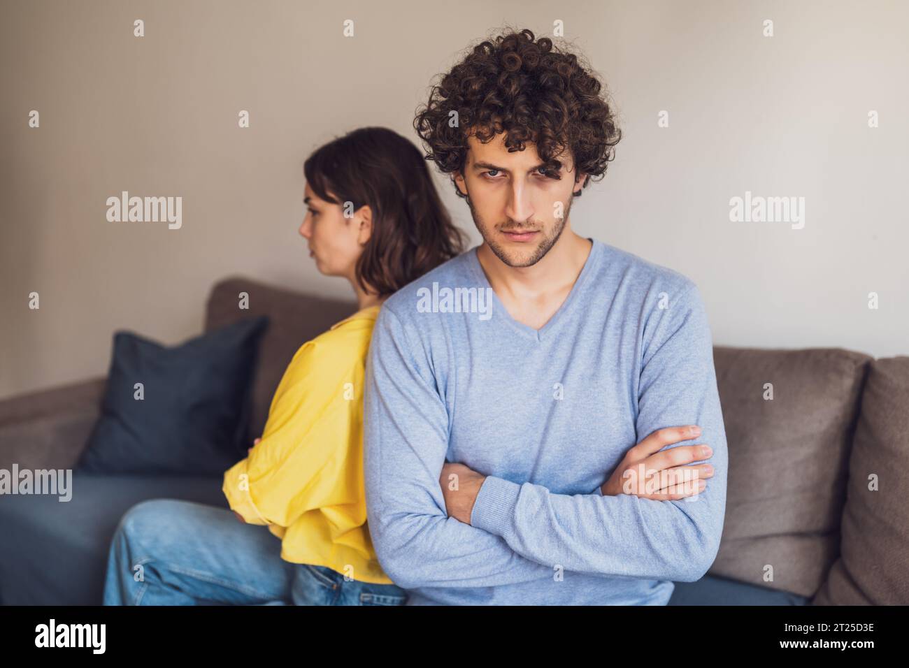 Two angry people back to back hi-res stock photography and images - Alamy