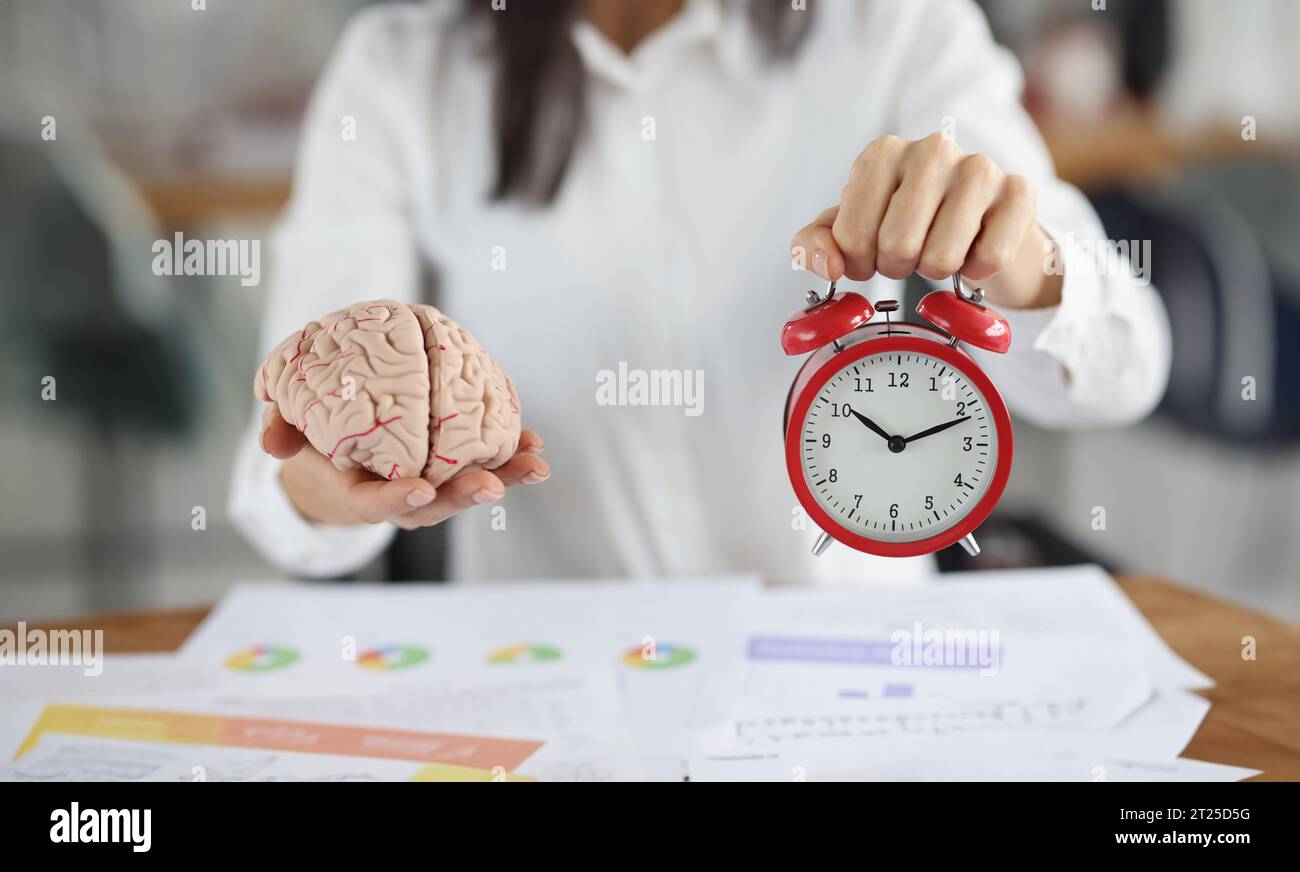 Female hold clock and brain miniature, work in progress, time to think ...