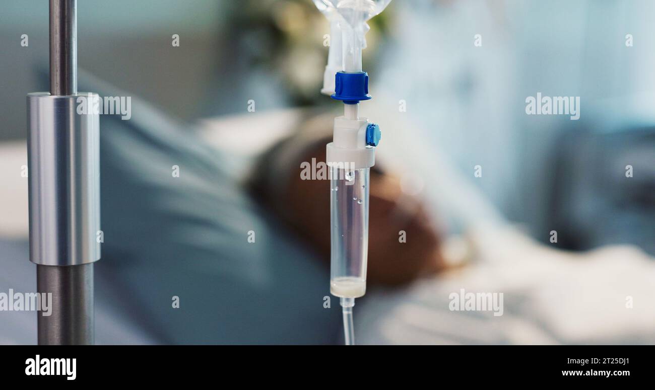 IV drip, health and medicine with patient in hospital, treatment and ...