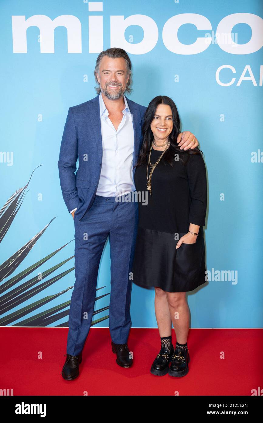 Cannes, France. 16th Oct, 2023. Josh Duhamel and Julie Pizzi attend the ...