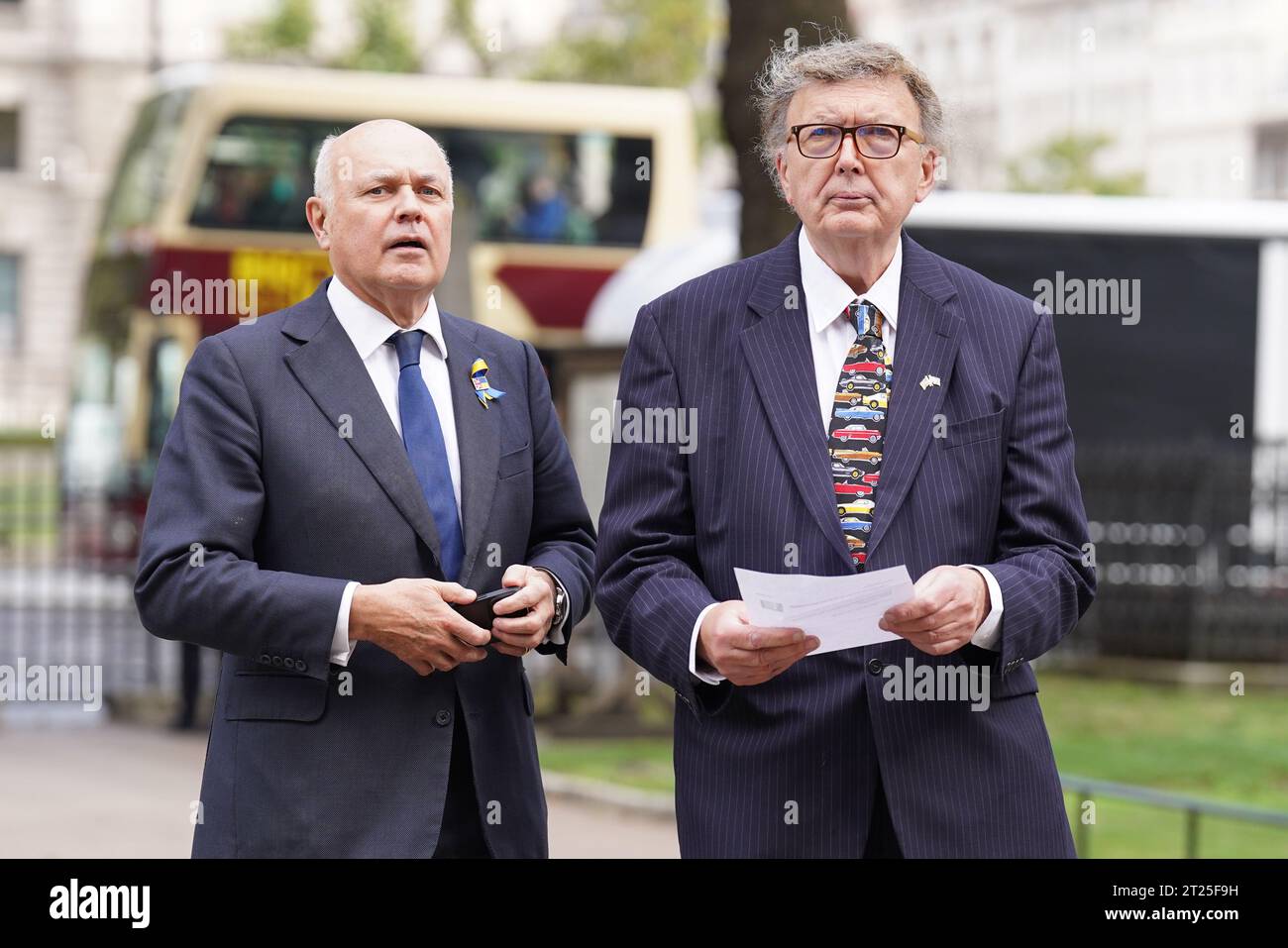 Sir Iain Duncan Smith (left) arrives for a Service of Thanksgiving for ...