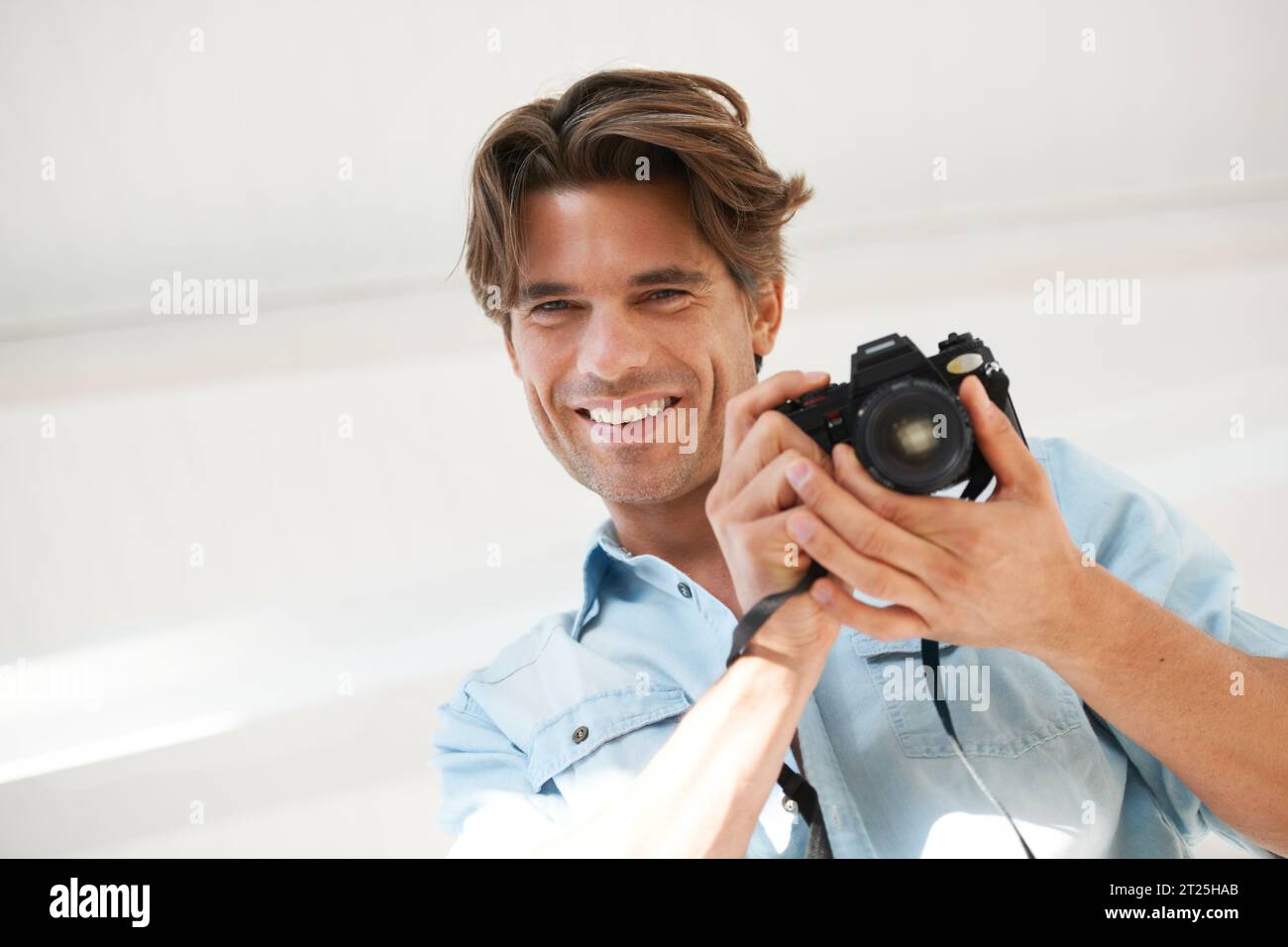 Pride, camera and portrait of man photographer at a photoshoot for ...