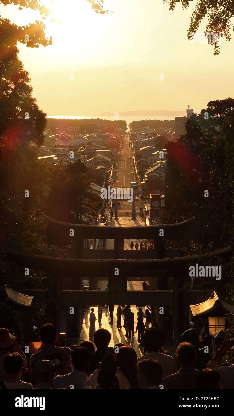 The approach to Miyajidake Shrine is illuminated by the setting sun ...