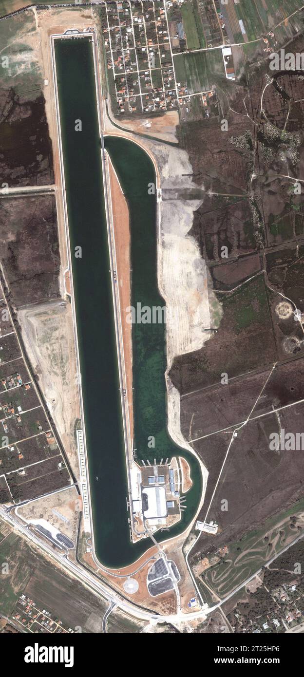 City, buildings and aerial of lake in town with street lines ...