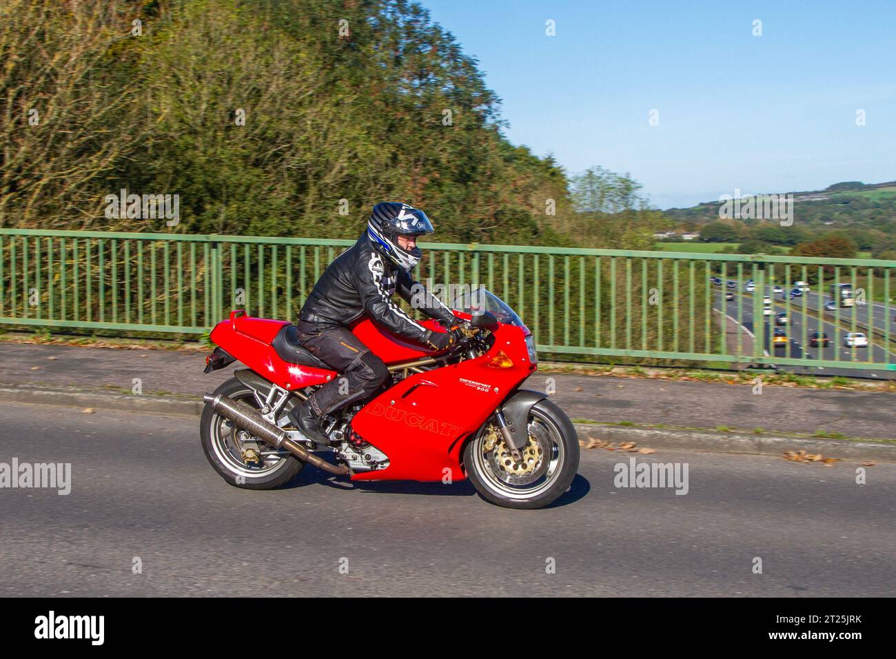 Man riding cafe racer motorcycle hi-res stock photography and images ...